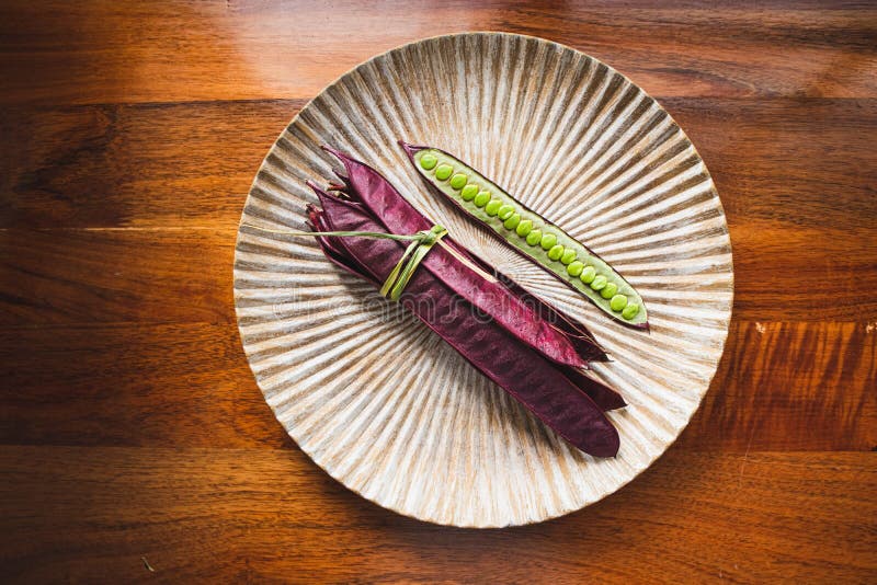 Bundle of Guaje Seed Pods on a Plate with an Open Seed Pod Stock Image ...