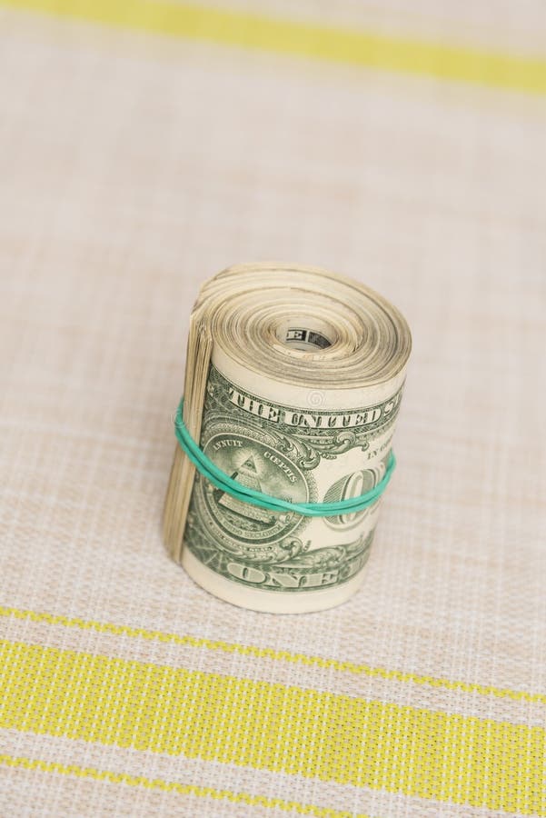 A Bundle of Money Twisted into a Bundle and Tied with a Green Rubber ...