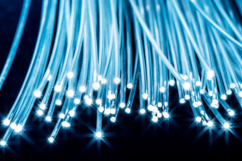 Bundle of Optical Fibers with Lights in the Ends. Blue Background Stock ...