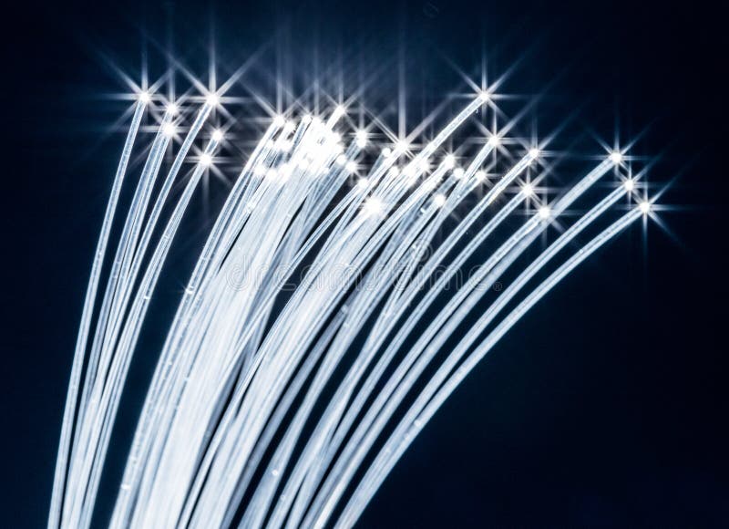 Bundle of Optical Fibers with Lights in the Ends. Blue Background Stock ...