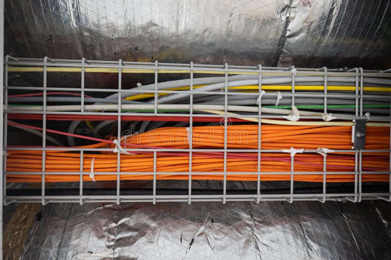 Bundle of Orange Ethernet Cables Routed in a Building Ceiling Along the ...