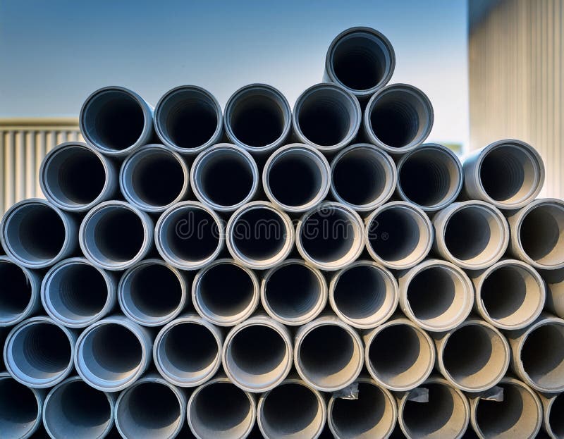 A Bundle of PVC Pipes in Various Sizes Placed Horizontally on a Clean ...