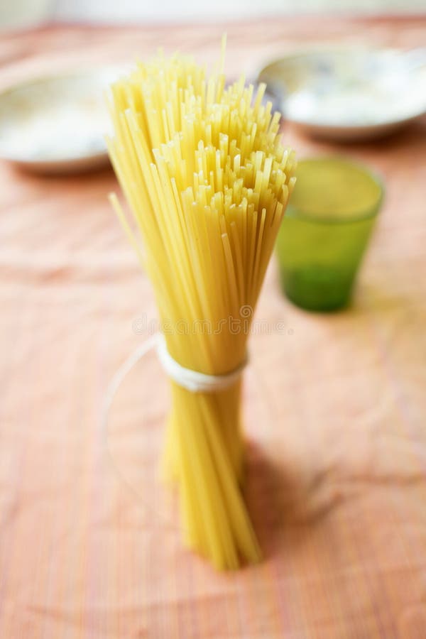 Bundle of raw spaghetti stock image. Image of bucatini - 97276125