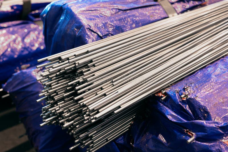 A Bundle of Stainless Steel Bars. Large Industrial Warehouse Metal ...