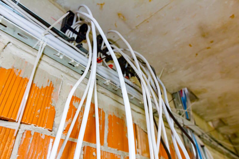 Bundle of Various Cables are Hanging from Above in Indoor of Building ...