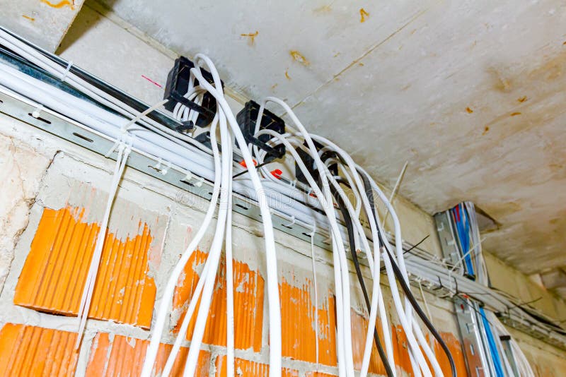 Bundle of Various Cables are Hanging from Above in Indoor of Building ...