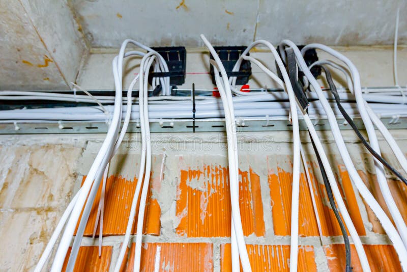 Bundle of Various Cables are Hanging from Above in Indoor of Building ...