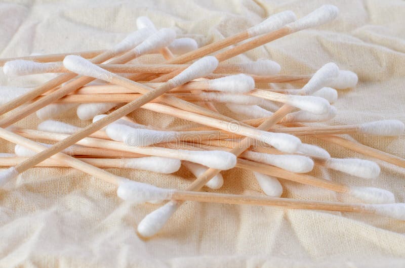 Bundle of White Cotton Swabs on Rustic Burlap Background. Stock Image ...