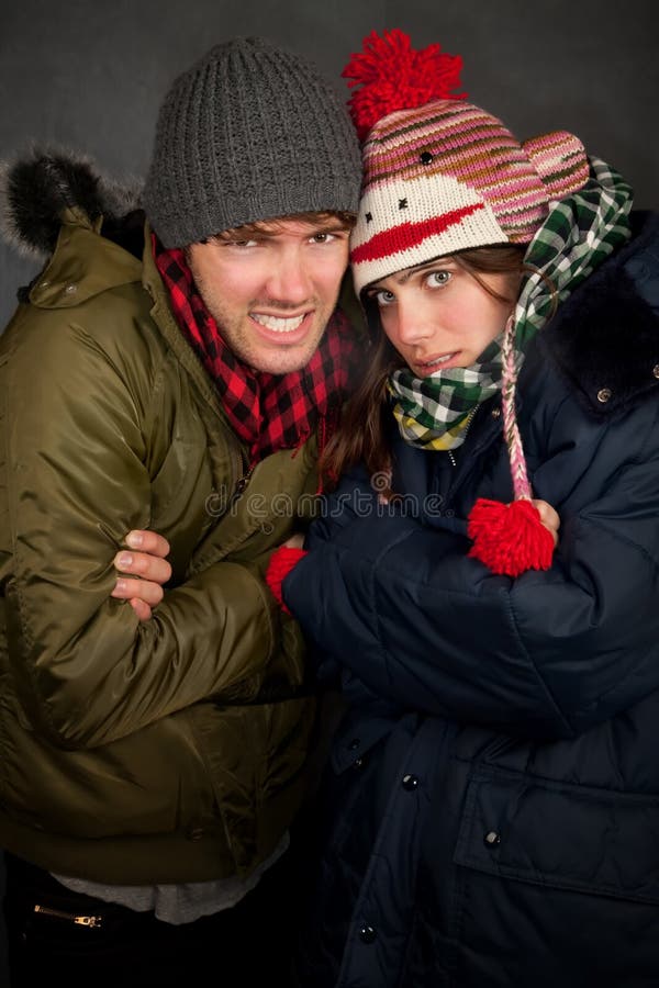 Bundled Up Couple stock photo. Image of jacket, face - 13771716