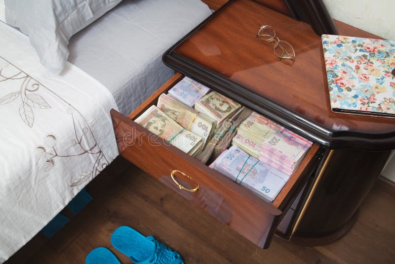 Bundles of Banknotes in Bedside Table Stock Image - Image of book ...