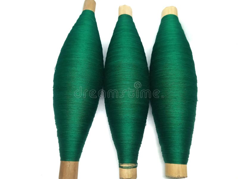 Bundles of Green Thread on White Background Stock Image - Image of ...