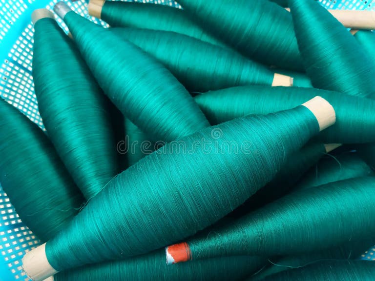 Bundles of Green Thread on White Background Stock Photo - Image of ...