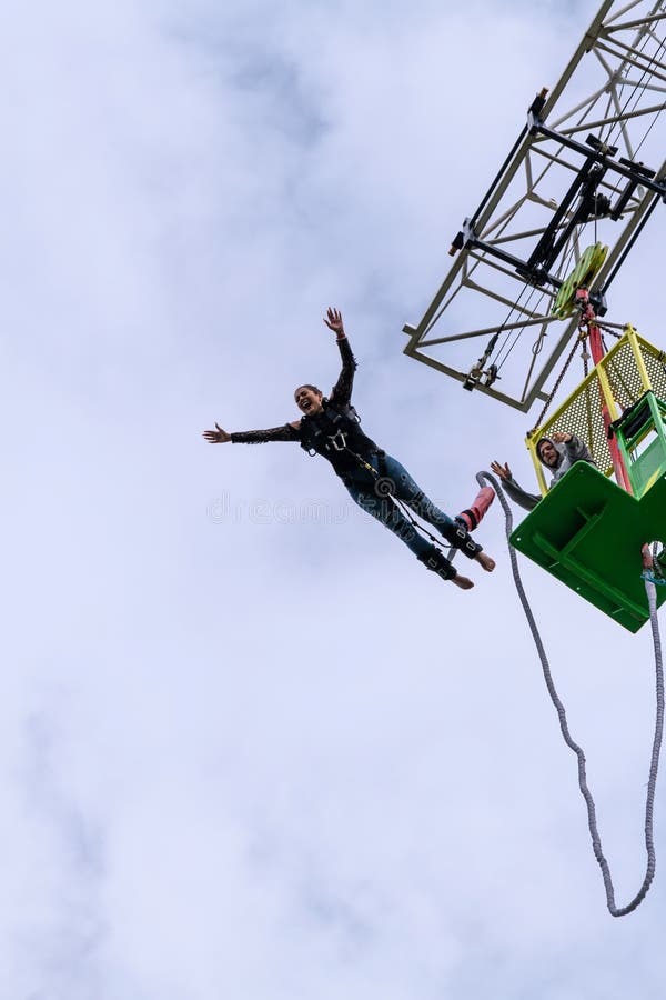 Bungee jumping in the sky editorial stock photo. Image of clouds ...