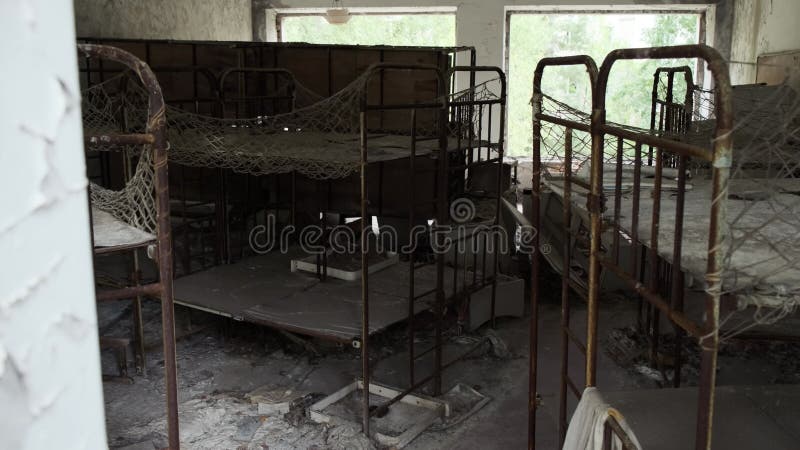 Bunk Beds Inside an Abandoned Kindergarten in Pripyat Ghost Town. Old ...