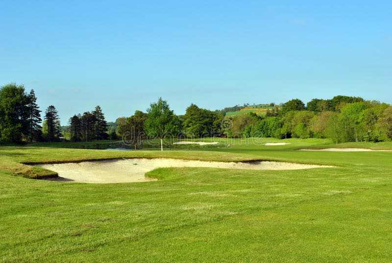 Bunker on a golf course stock photo. Image of golfer - 15708110