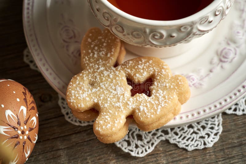 Bunny Shaped Linzer Easter Cookie with a Cup of Tea and Decorated ...