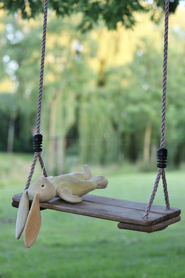Bunny on swing stock photo. Image of blurred, bunny - 200980488