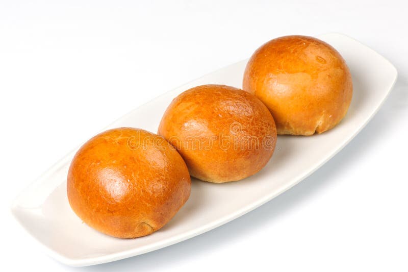 Buns on the plate stock image. Image of goods, heap, cereal - 26558661