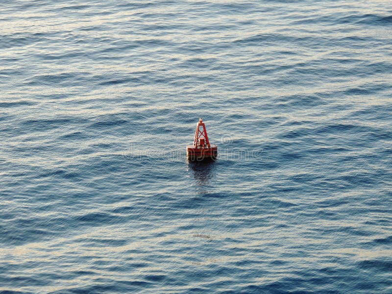 Buoy Floating in the Ocean stock photo. Image of lost - 52766796