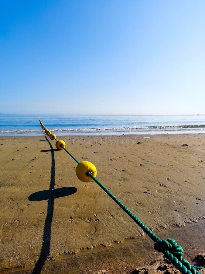 Rope on the beach stock image. Image of closeup, shade - 233853