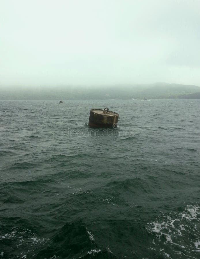 Buoy in the sea stock photo. Image of buoy, horizon - 233539996