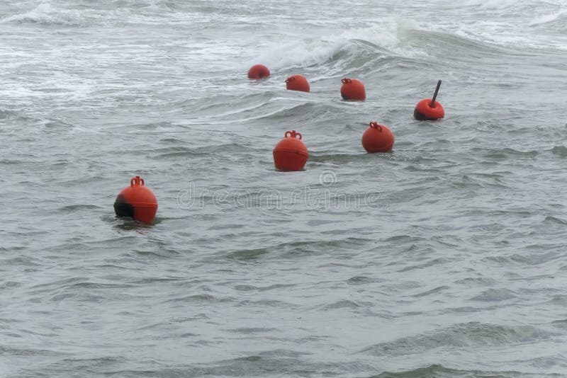 Buoys floating rough sea stock image. Image of float - 104884329