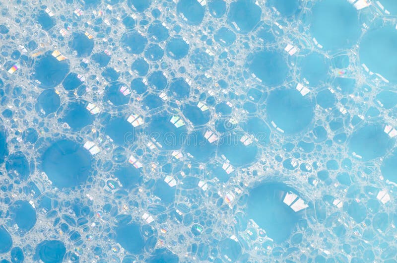 Burbujas De La Espuma En Fondo Azul Foto de archivo - Imagen de blanco ...