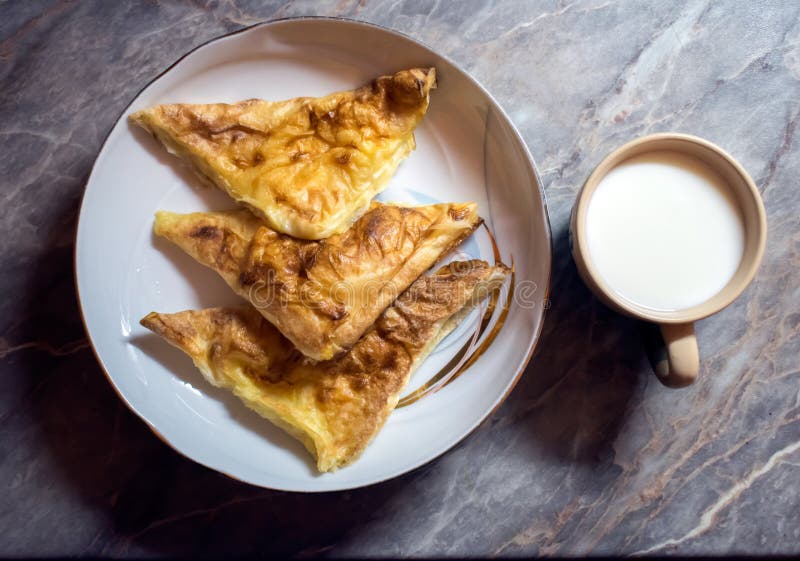 Burek with Cheese.Balkanic Pie on the Plate and Yogurt Stock Image ...