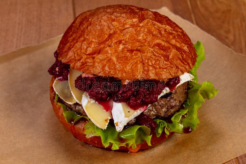 Burger with beef and brie stock photo. Image of brie - 124570702