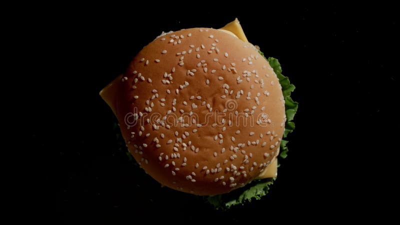Burger on a Black Background Stock Photo - Image of close, tomato ...