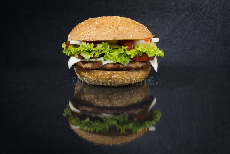 Burger on black background stock photo. Image of black - 136908968