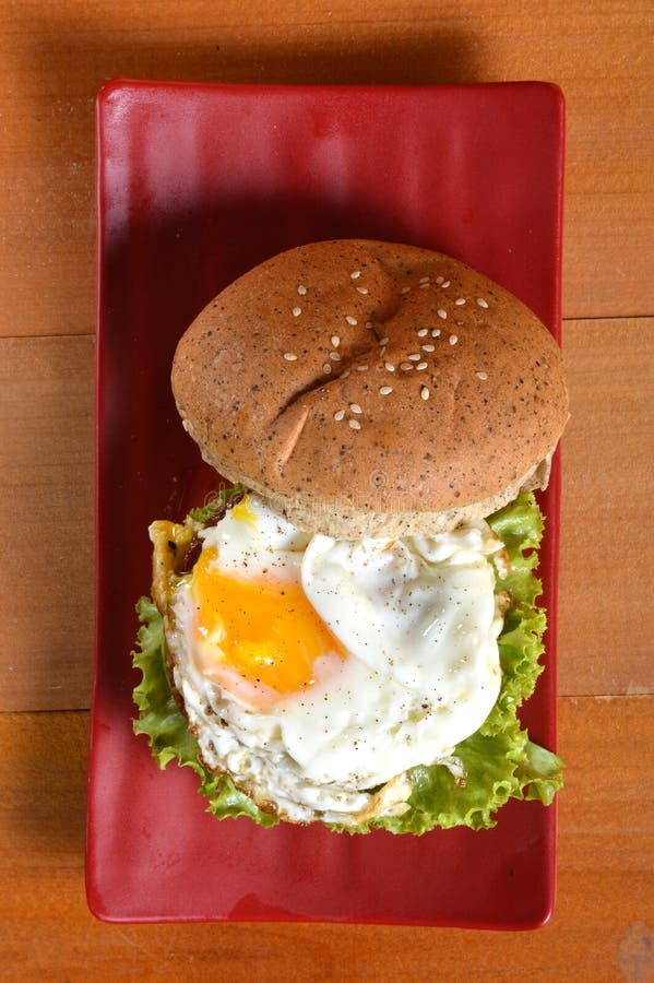 Burger with black pepper stock image. Image of portion - 69606097