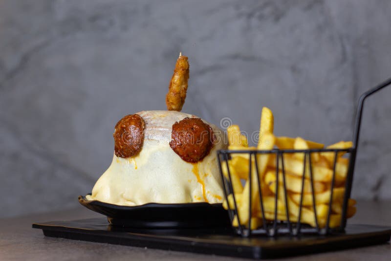 Burger Covered in Melted Cheese with Chunks of Meat Stock Image - Image ...