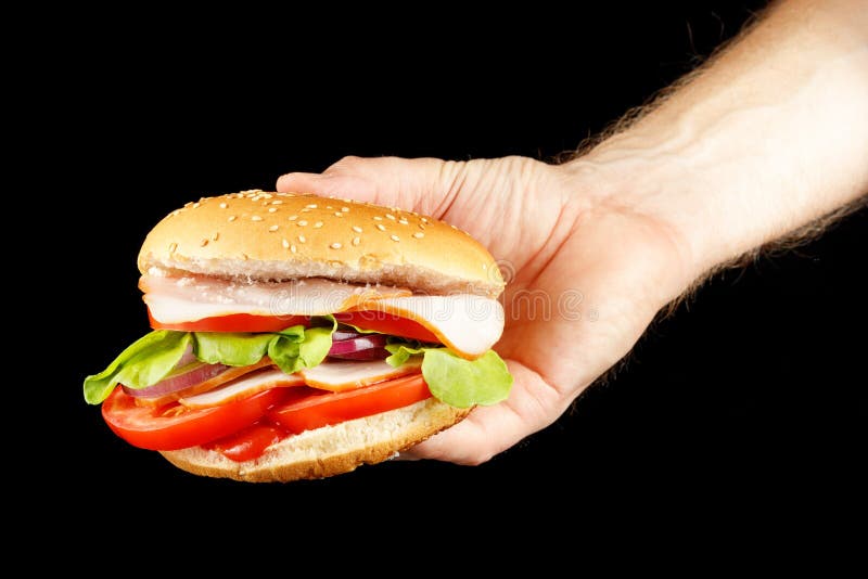 Burger in Hand Isolate on Black Stock Image - Image of holding, classic ...