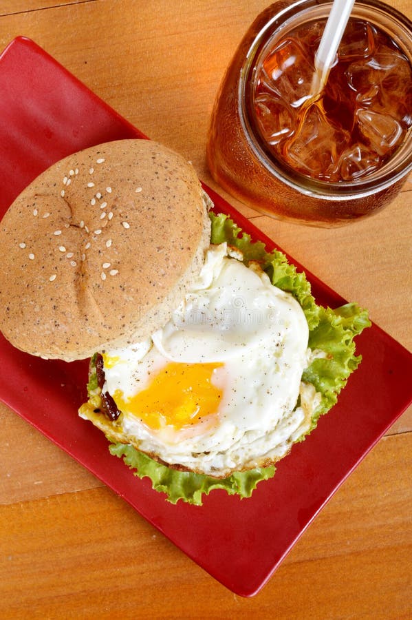 Burger and iced tea stock photo. Image of gourmet, brown - 69608102