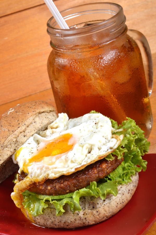 Burger and iced tea stock image. Image of gourmet, glass - 69608193