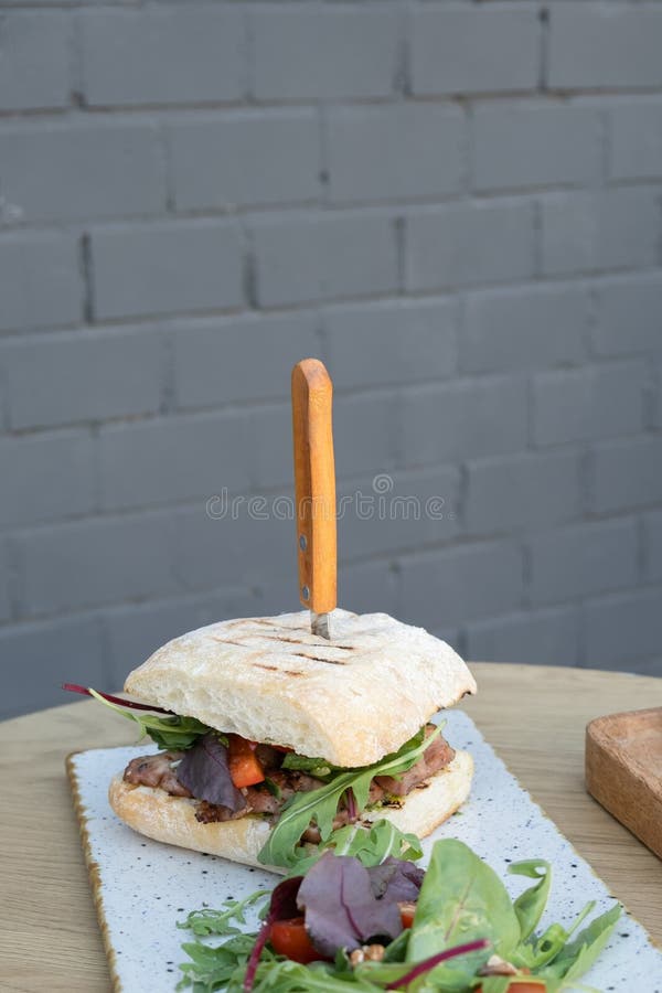 Burger with Meat and Vegetables on Wooden Table Top View Stock Image ...
