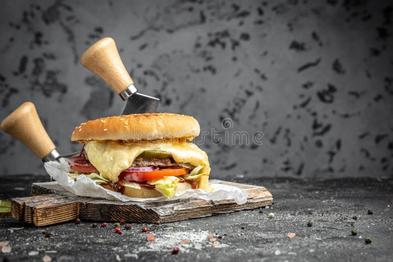 Burger with Melted Cheese, Big Cheeseburger with Lots of Cheese Stock ...
