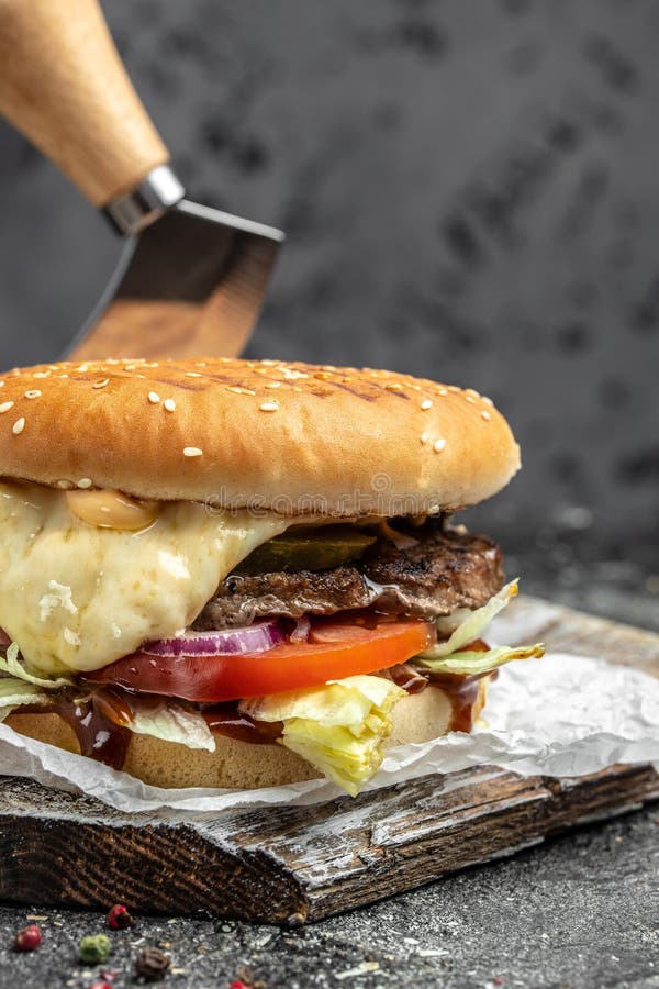 Burger with Melted Cheese, Big Cheeseburger with Lots of Cheese Stock ...