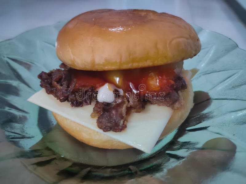 Burger on the plate stock photo. Image of meal, food - 213295720