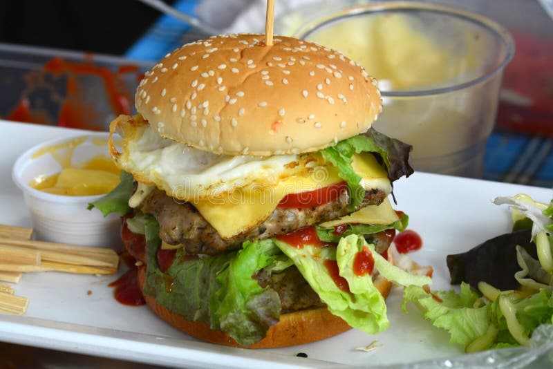 Burger Stacked High stock image. Image of lettuce, meal - 72557569