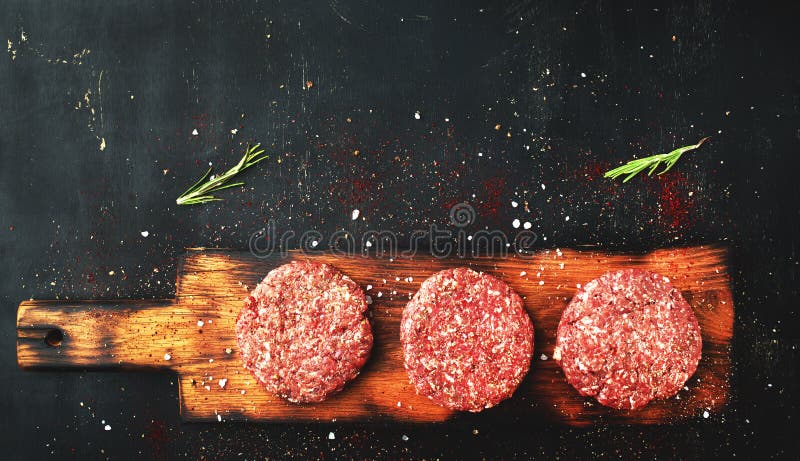 Raw Steak Cutlets or Patty with Mince Ground Beef Meat. Wooden ...