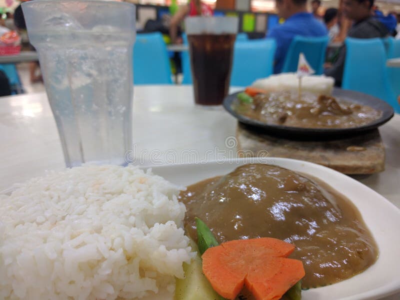 Sizzling Burger Steak with Gravy Stock Photo - Image of juicy, cast ...