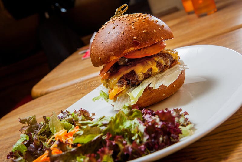 Burger on the table stock photo. Image of rustic, classic - 134037404