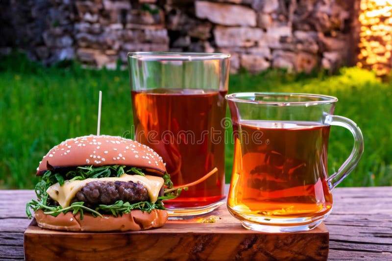 Burger and Tea stock illustration. Illustration of tasty - 289015920