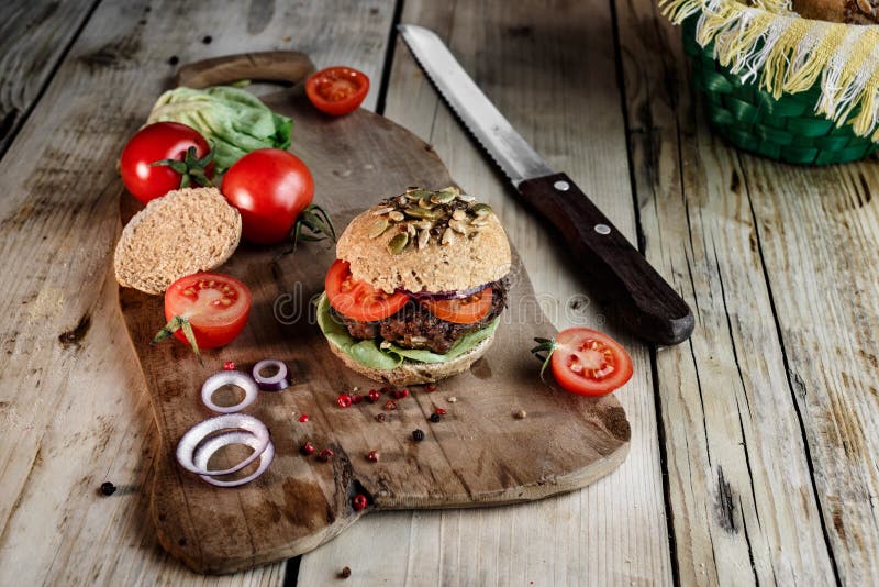 Burger and Whole Wheat Bread Stock Image - Image of grain, high: 85851383