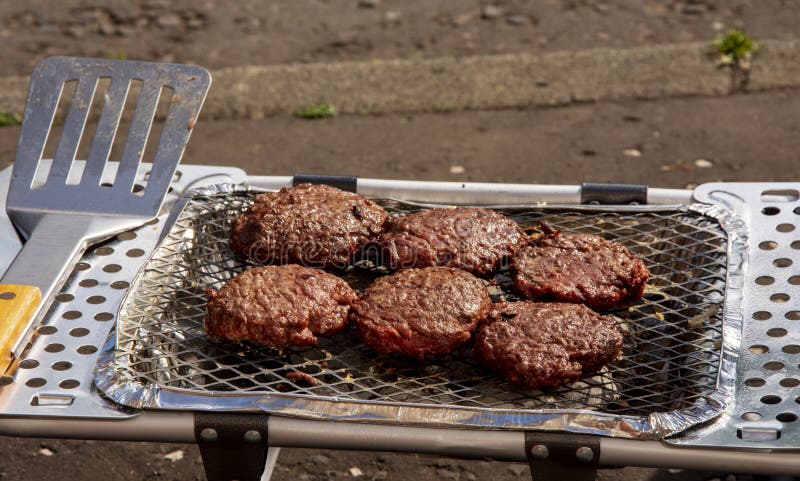 Burgers Being Cooked on Portable BBQ Stock Image - Image of burger ...