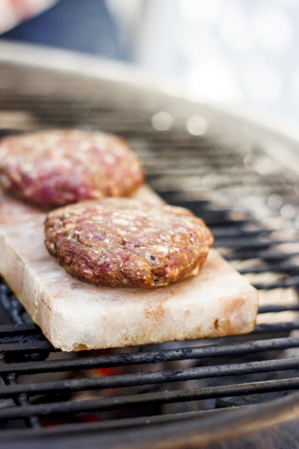 Family Having Burgers Off the Grill Stock Image - Image of beach, copy ...