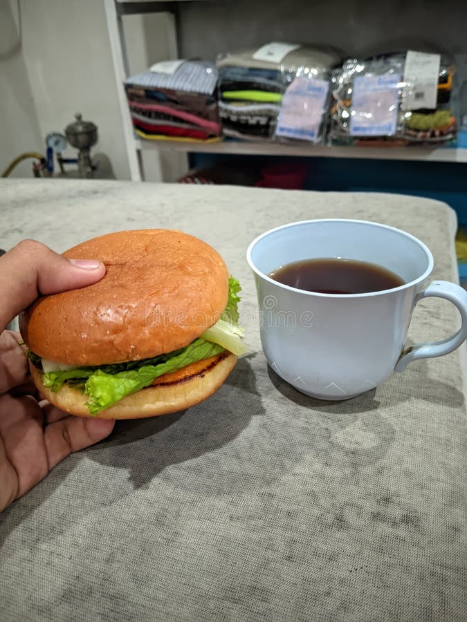 Burgers and tea stock image. Image of fresh, enjoyment - 362841589