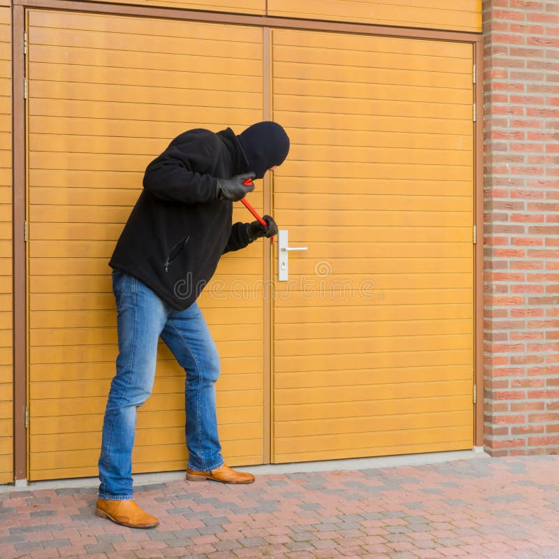 Burglar with a crowbar stock image. Image of security - 36591917
